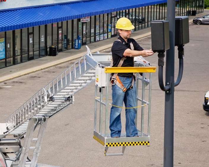 van-ladder-in-use - Van Ladder Bucket Trucks