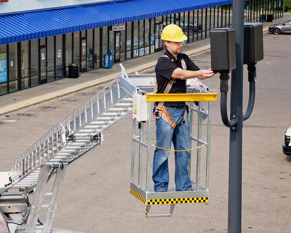 van-ladder-in-use - Van Ladder Bucket Trucks